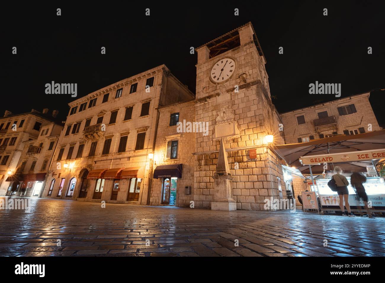 25 October 2024, Kotor, Montenegro: Tourists buying ice cream in front ...