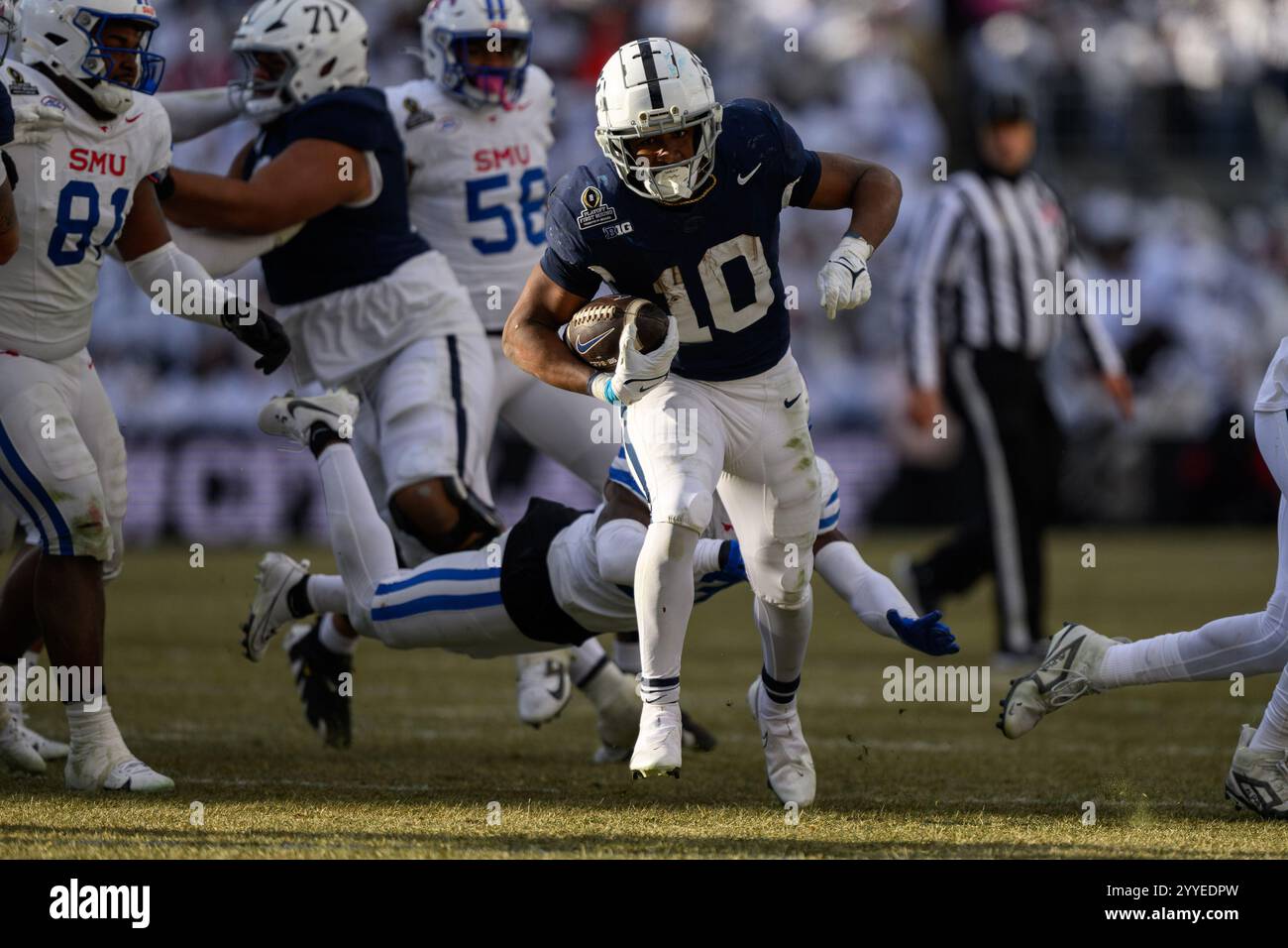 State College, PA, USA. 21st Dec, 2024. Penn State Nittany Lions running back Nicholas Singleton ...