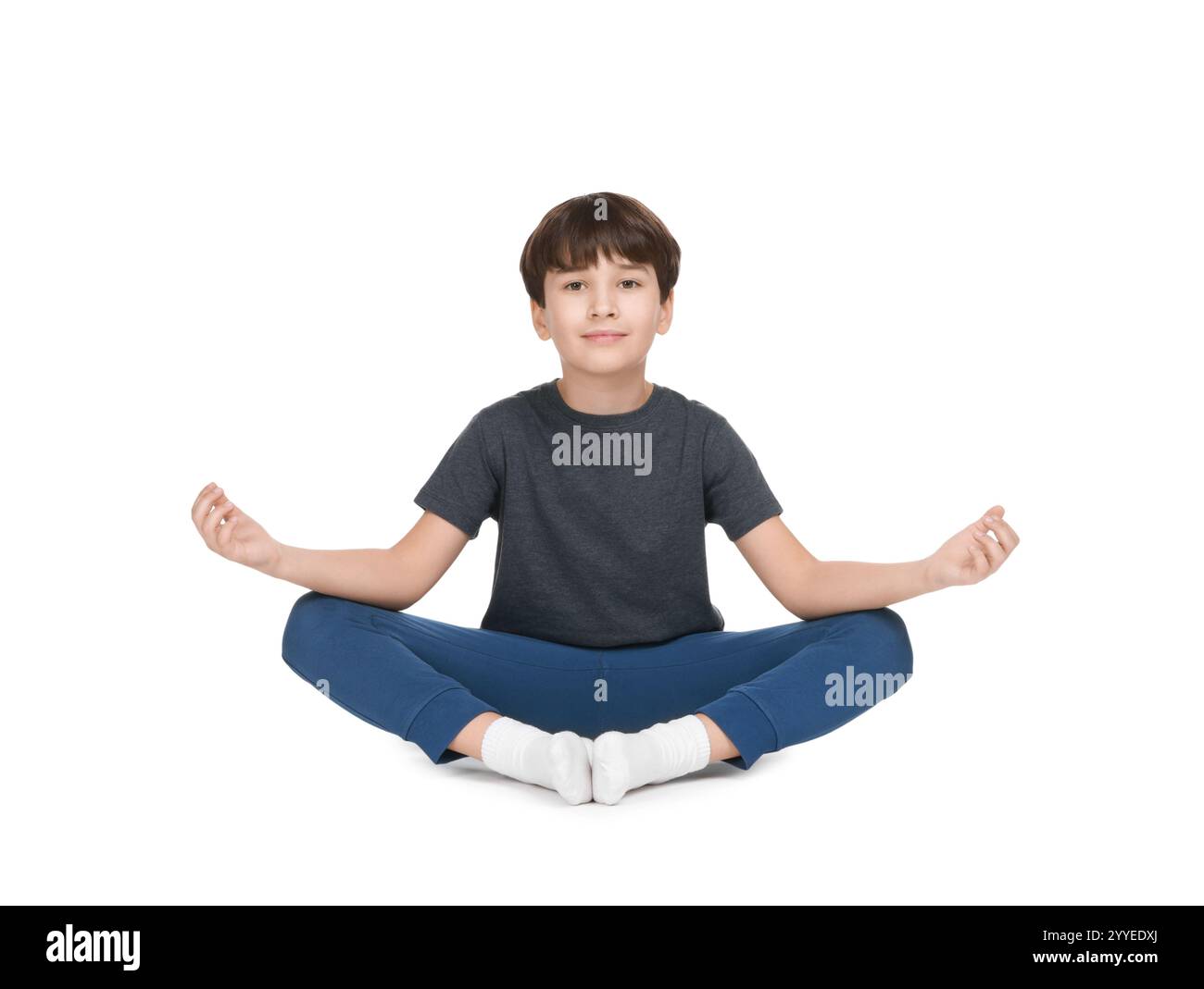 Boy doing exercise on white background. Sport activity Stock Photo - Alamy