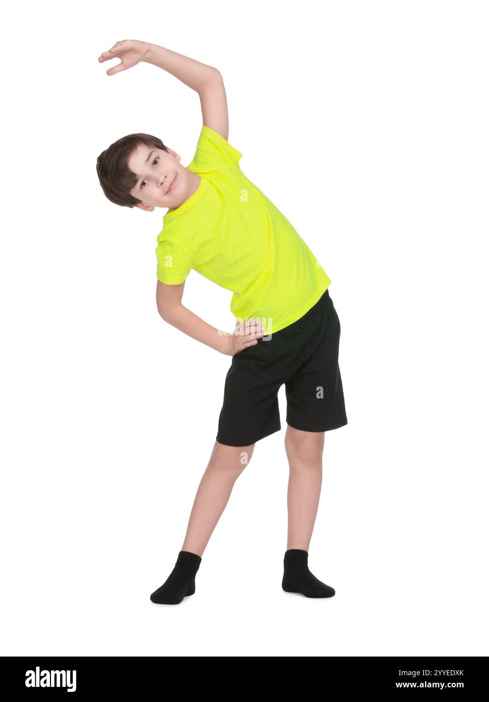 Boy doing exercise on white background. Sport activity Stock Photo - Alamy