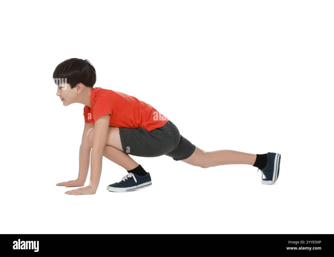 Boy doing exercise on white background. Sport activity Stock Photo - Alamy