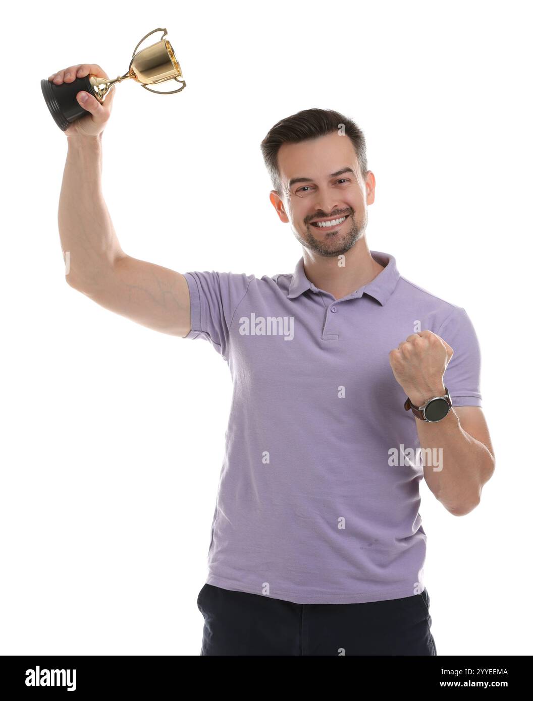 Happy winner with golden trophy cup on white background Stock Photo - Alamy