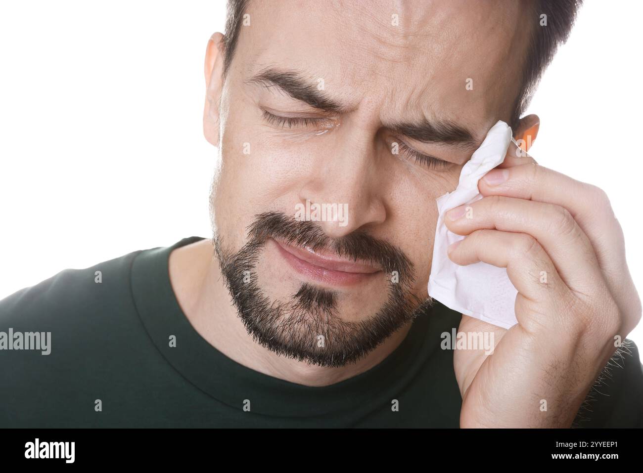Sad man with paper tissue crying on white background Stock Photo - Alamy