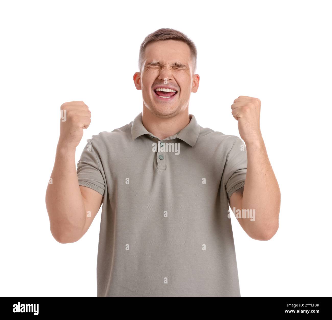 Portrait of happy winner on white background Stock Photo - Alamy