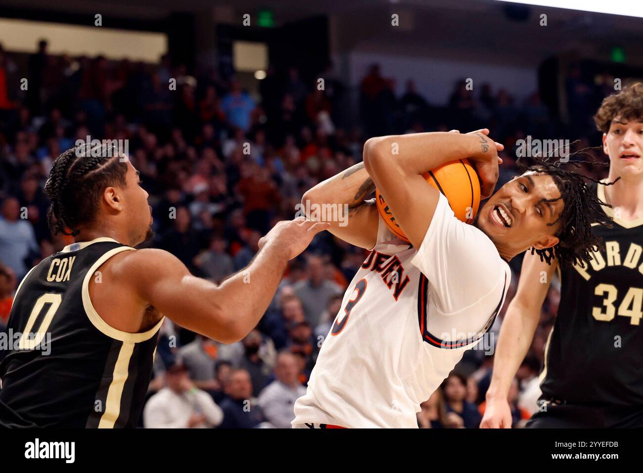 Auburn forward Jahki Howard (3) wrestles a rebound away from Purdue ...