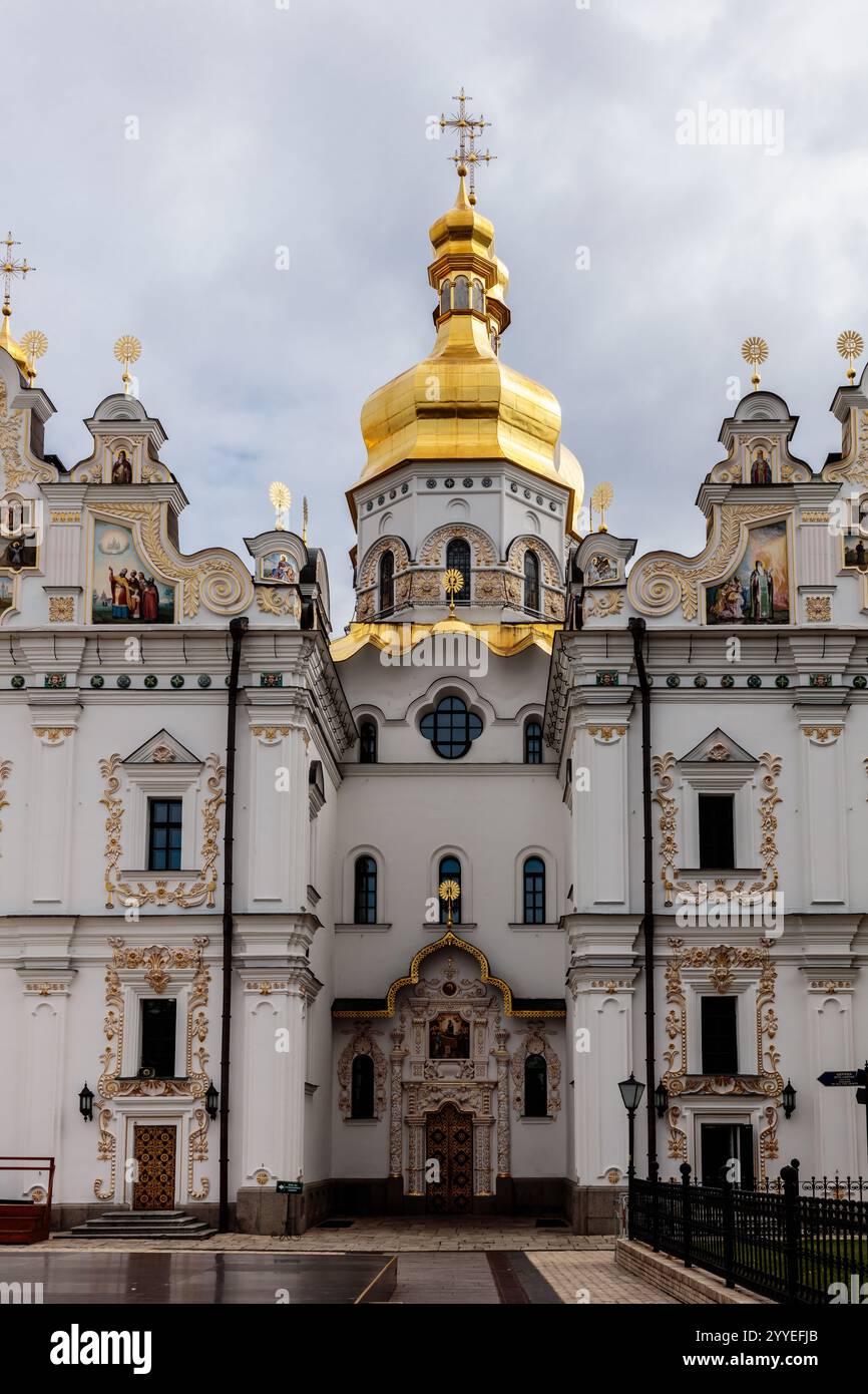 The building is white and gold. It is a church. The building is very ...