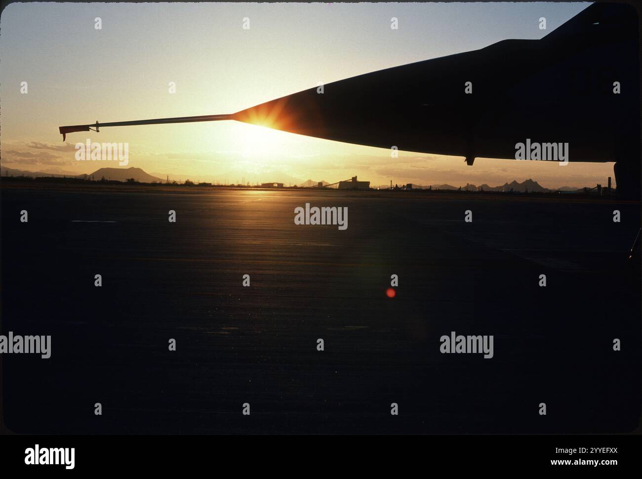 Silhouetted pitot boom and radome of F-106A at sunset. Det 1 120th FIG ...