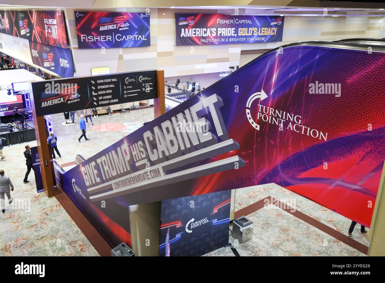 Phoenix, USA. 21st Dec, 2024. The escalators wrap at AmericaFest at the ...