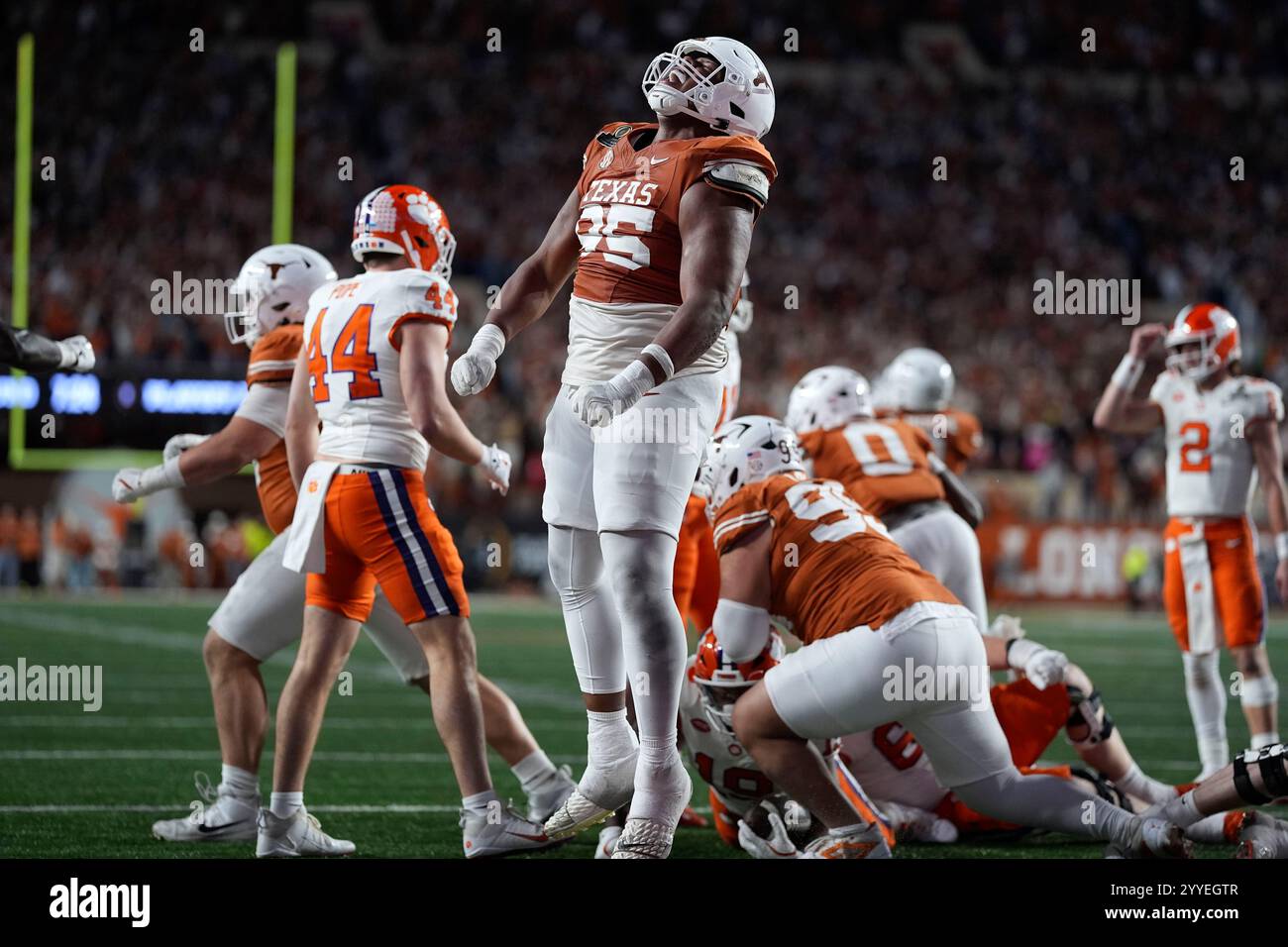 Texas defensive lineman Alfred Collins (95) celebrates after a ...