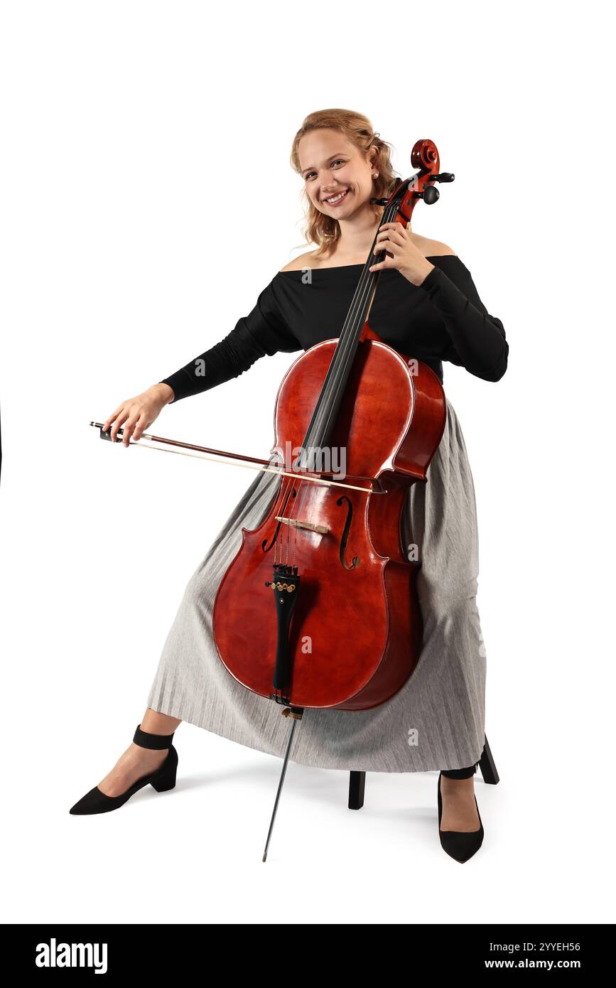 Beautiful young woman playing cello on white background Stock Photo - Alamy