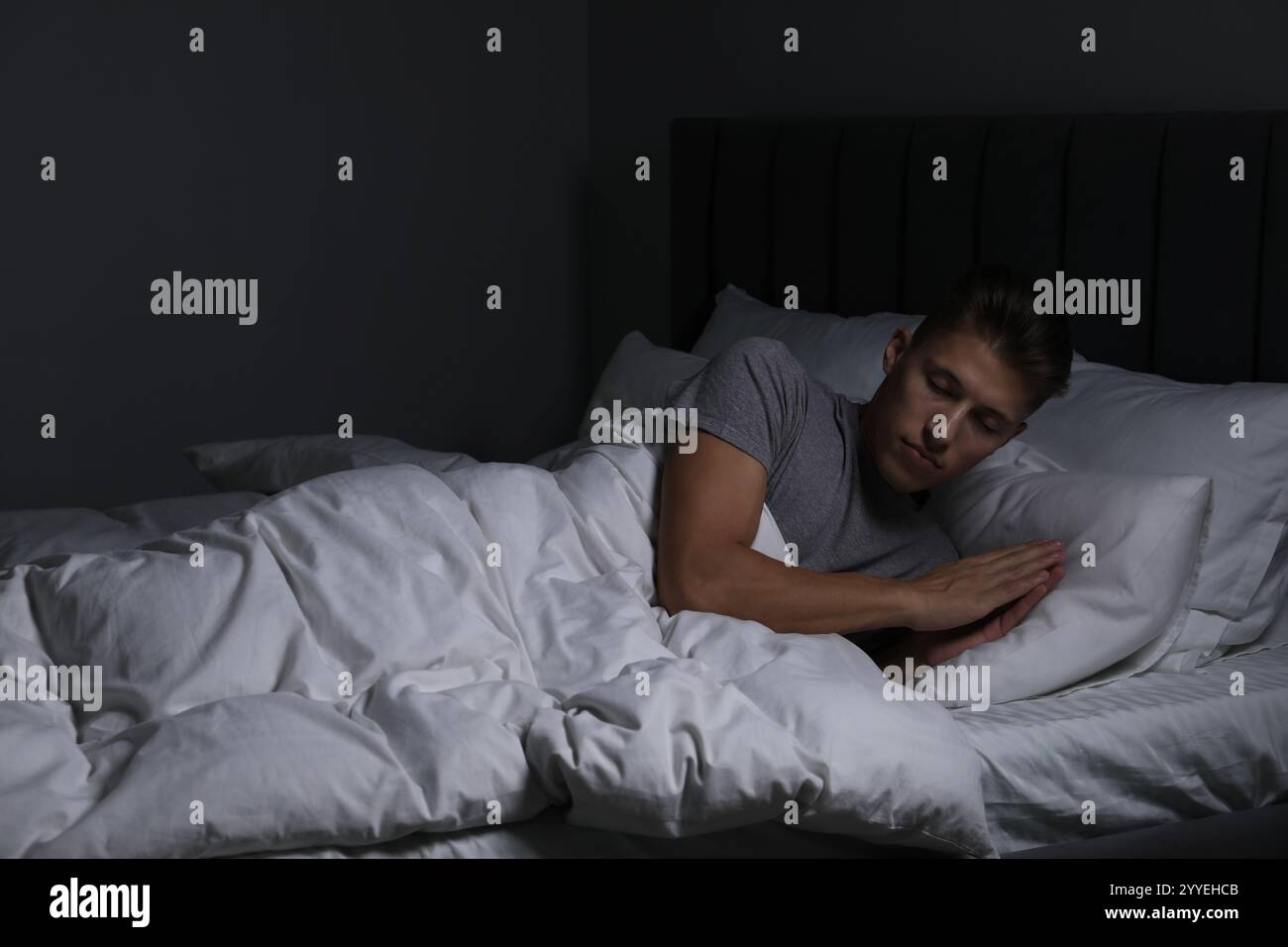 Young man sleeping in hi-res stock photography and images - Alamy