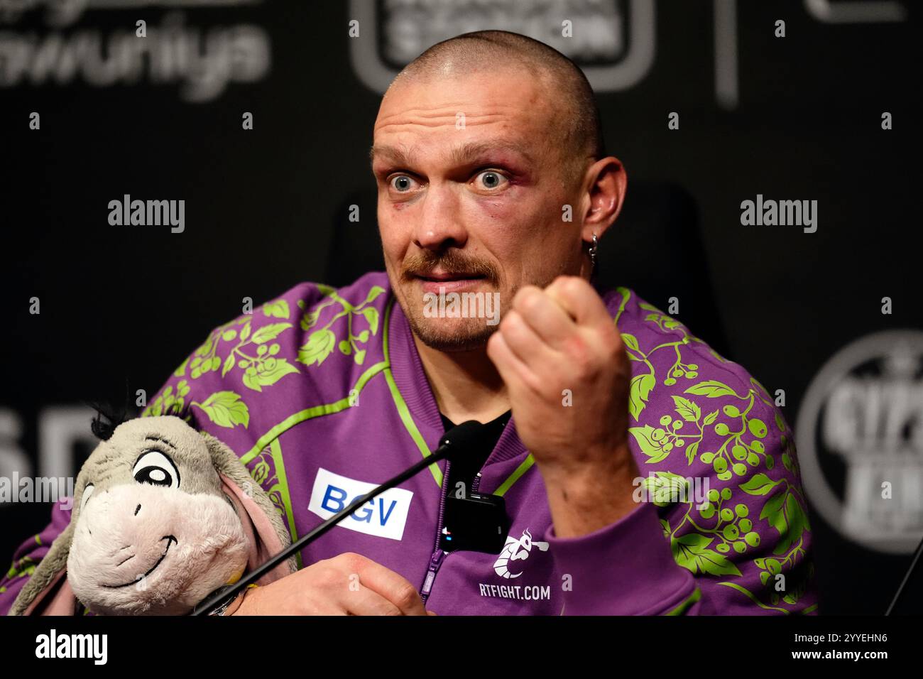Oleksandr Usyk with an Eeyore teddy during a press conference following ...