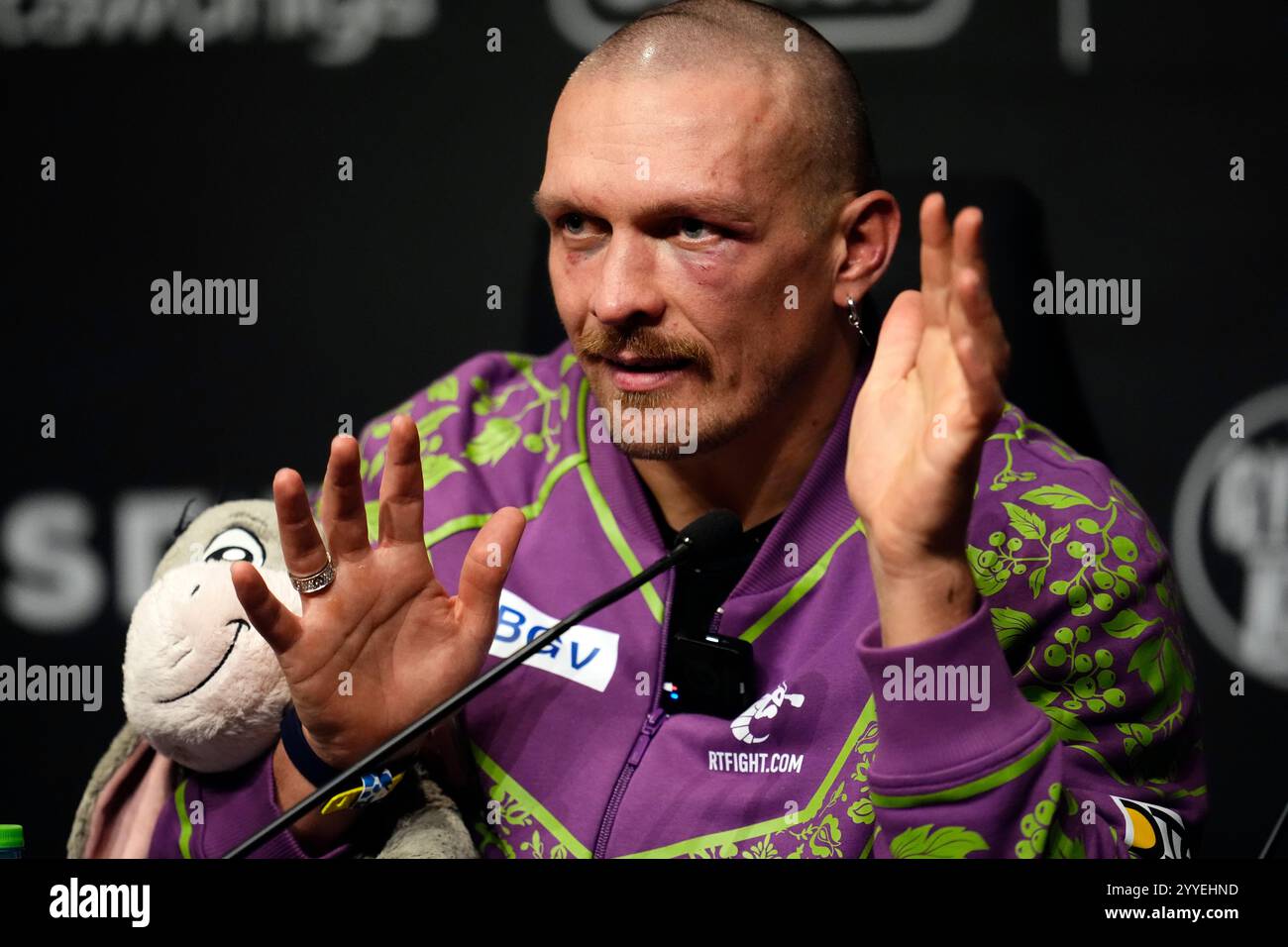 Oleksandr Usyk with an Eeyore teddy during a press conference following ...