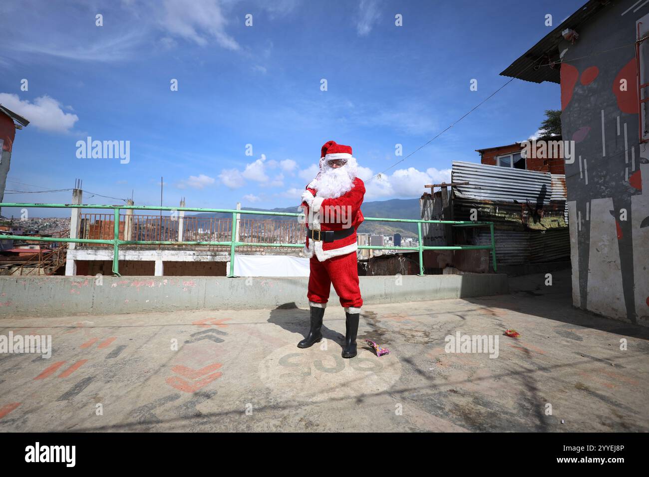 Caracas, Venezuela. 21st Dec, 2024. A man dressed as Santa Claus ...
