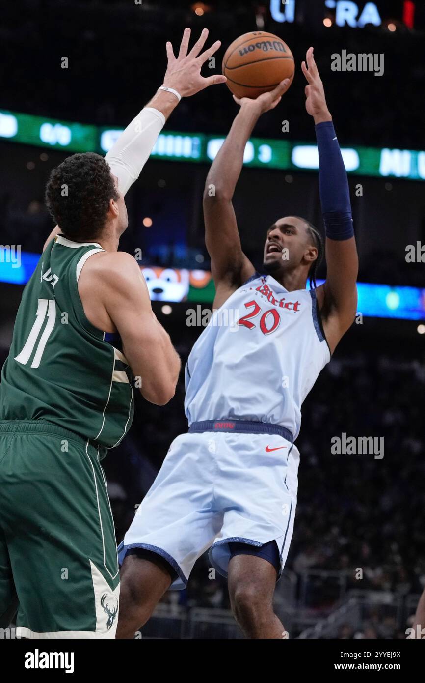 Washington Wizards' Alexandre Sarr shoots over Milwaukee Bucks' Brook ...