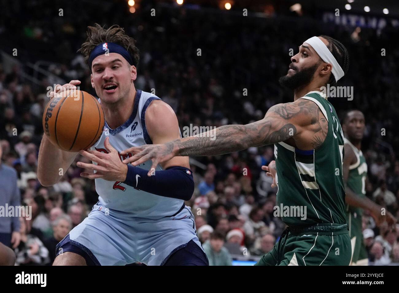 Milwaukee Bucks' Gary Trent Jr. fouls Washington Wizards' Corey Kispert ...