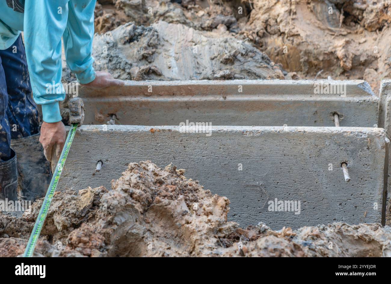 worker align cement drain water in construction site Stock Photo - Alamy