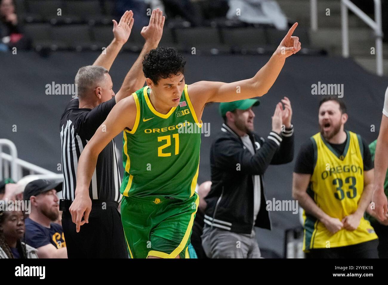 Oregon forward Brandon Angel (21) gestures after scoring against ...
