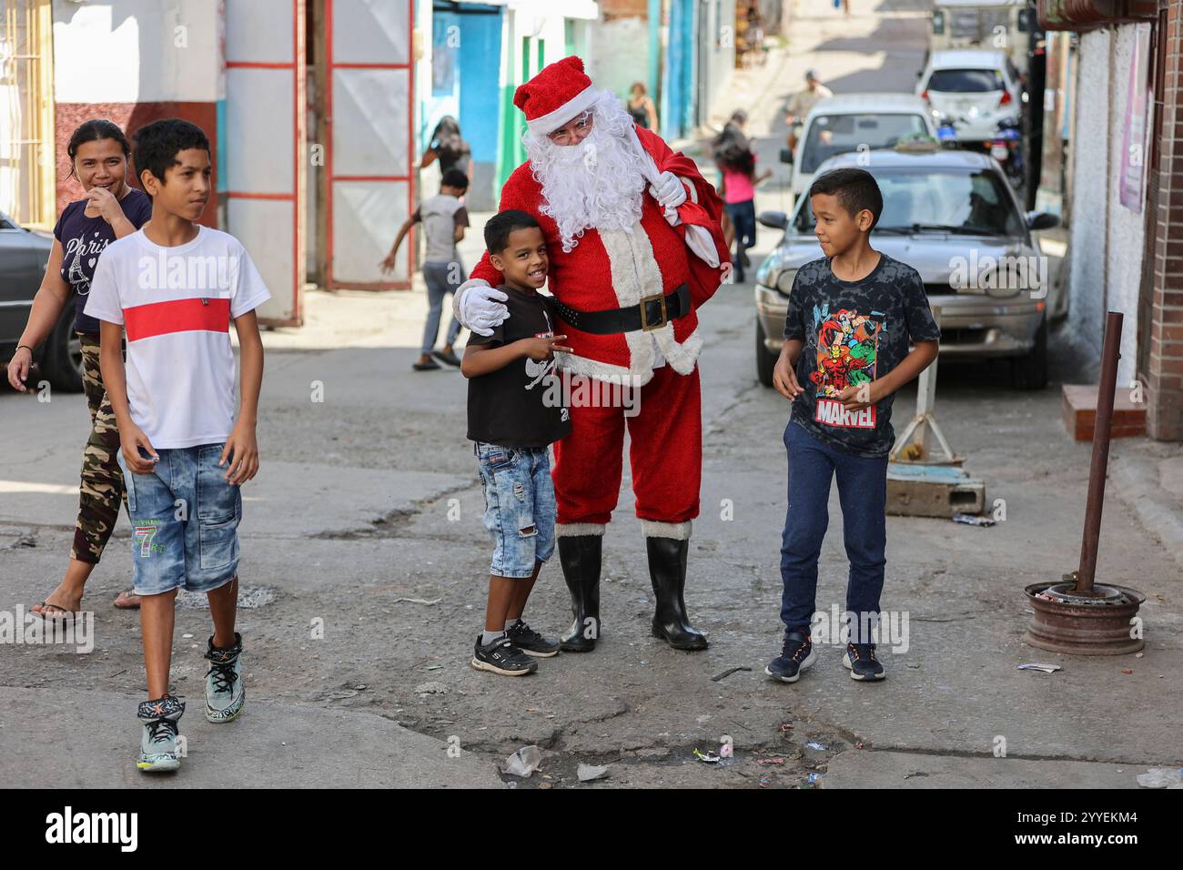 Caracas, Venezuela. 21st Dec, 2024. A man dressed as Santa Claus ...
