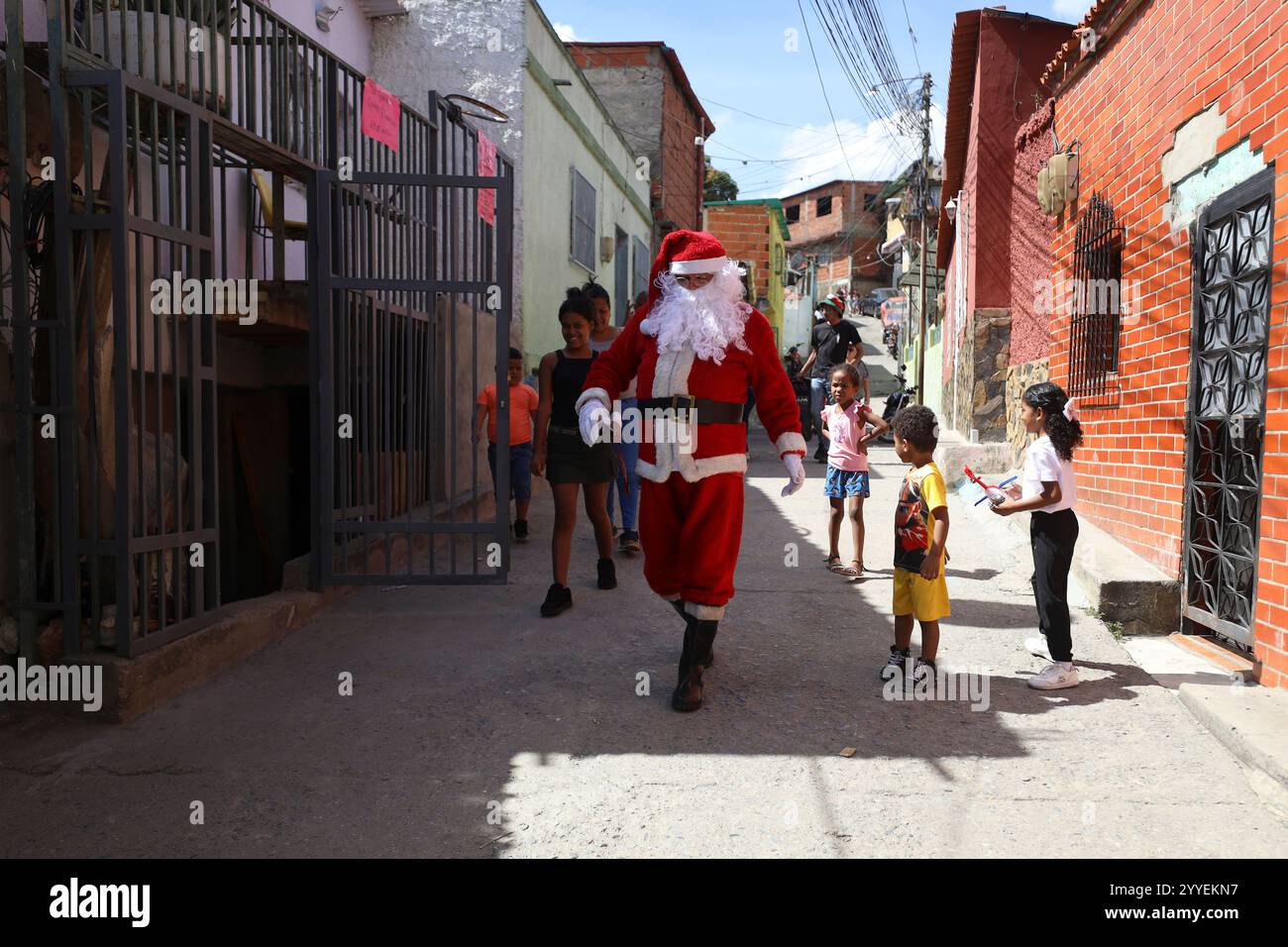 Caracas, Venezuela. 21st Dec, 2024. A man dressed as Santa Claus goes ...