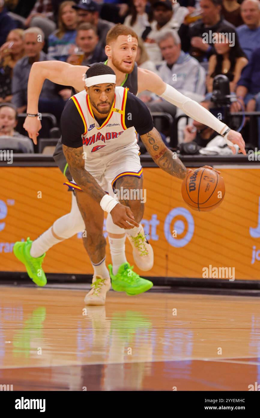 Golden State Warriors guard Gary Payton II, front, drives past ...