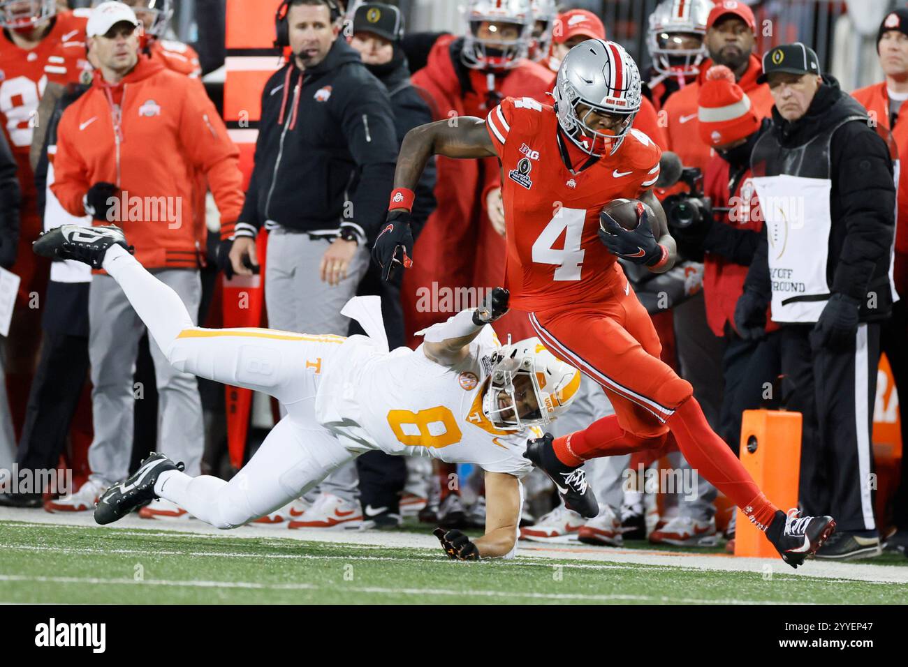 Tennessee linebacker Kalib Perry, left, forces Ohio State receiver ...