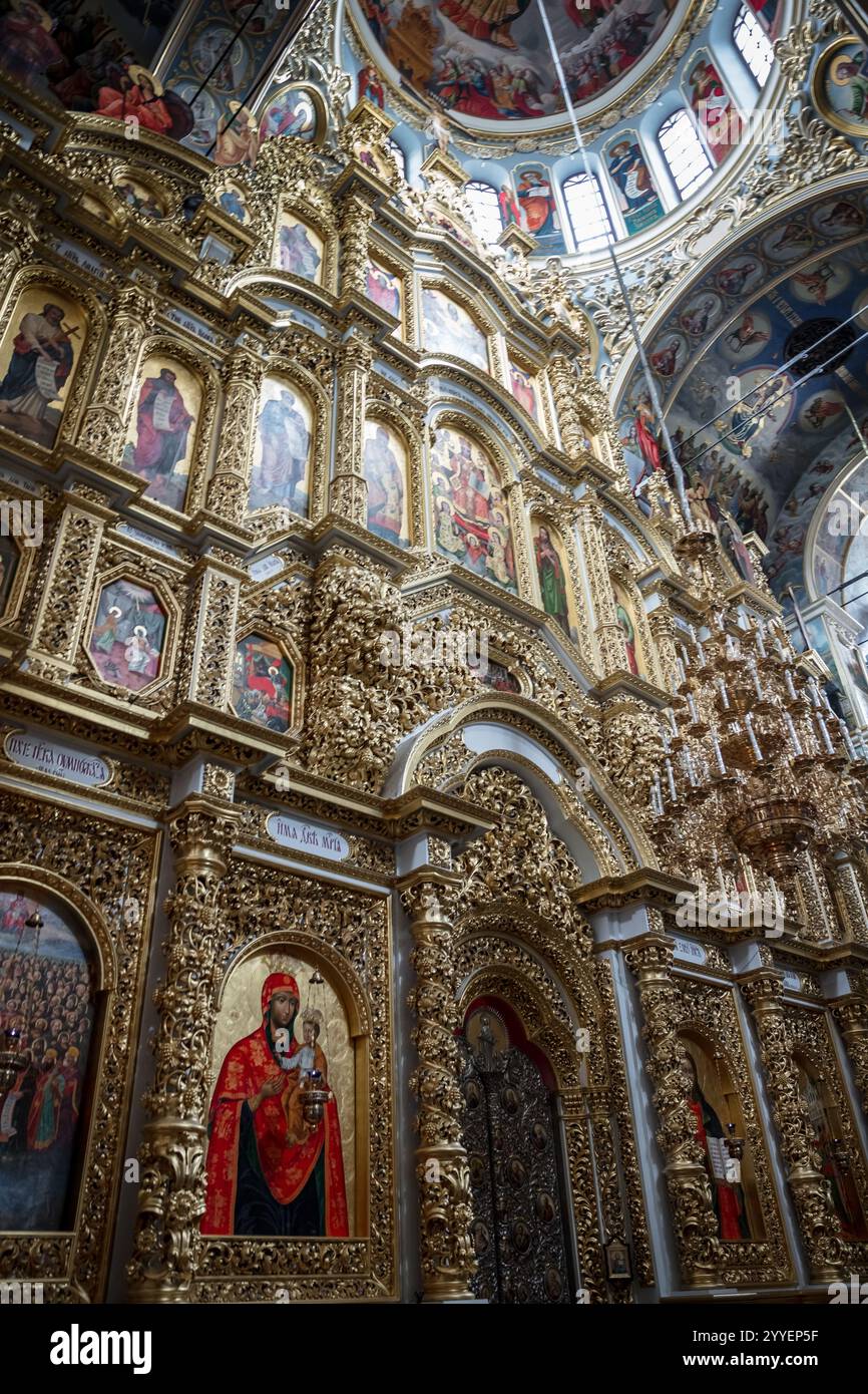 The inside of a church is decorated with gold and gold leaf. The walls ...