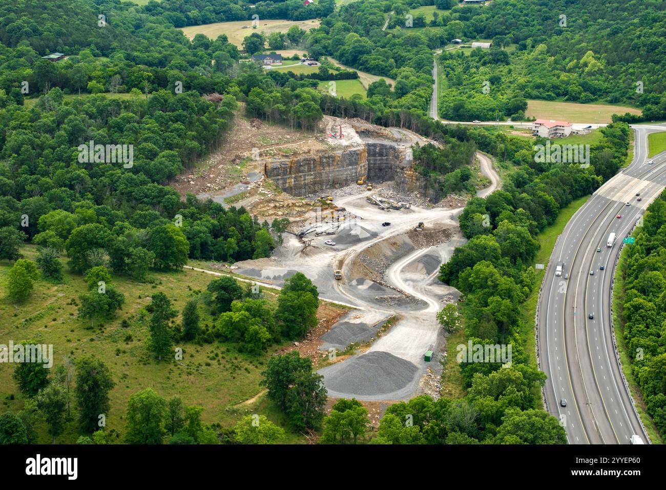 Industrial open-pit mining site with limestone quarry at mountain ...