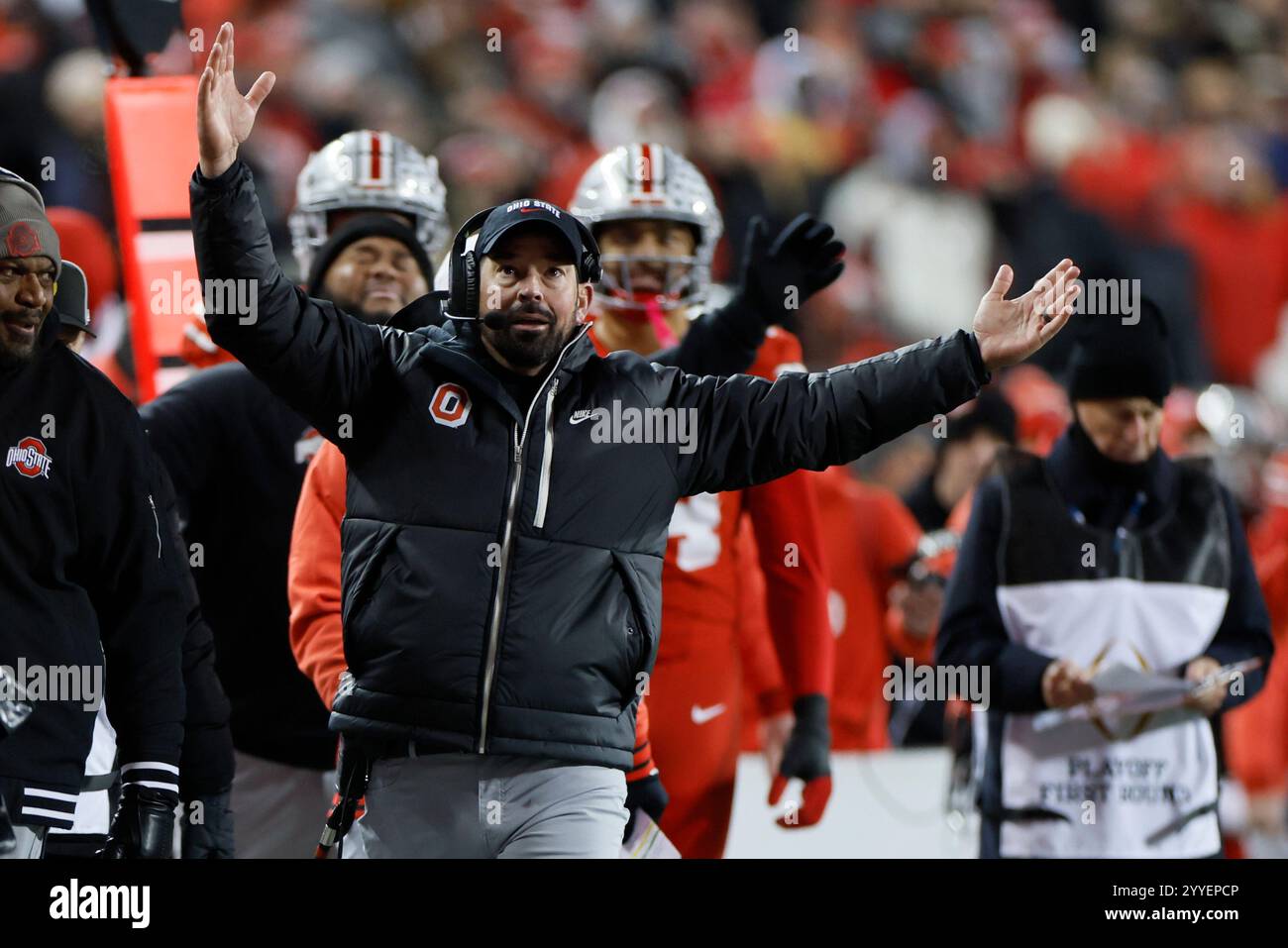 Ohio State head coach Ryan Day, front, reacts to the video replay ...
