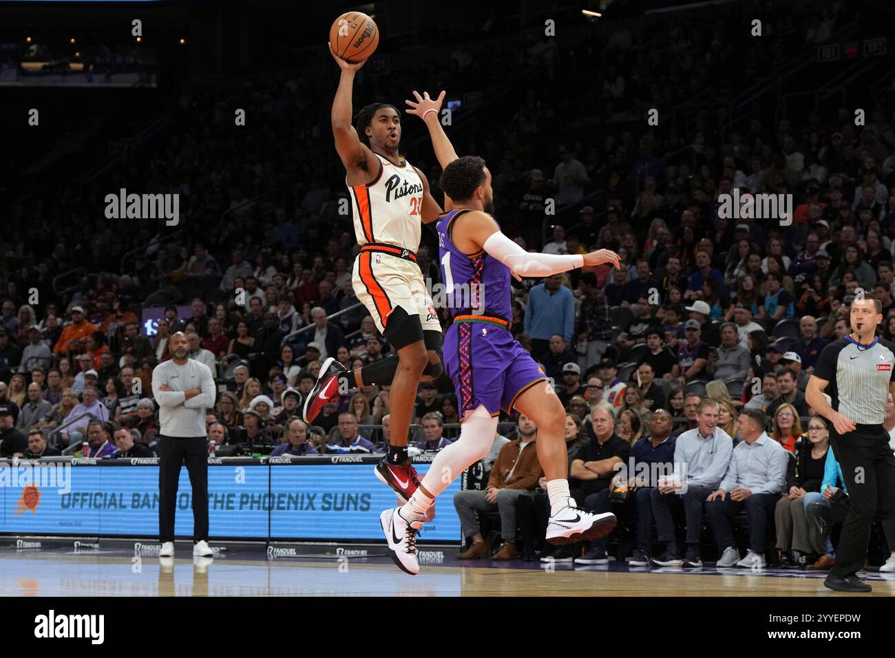 Detroit Pistons guard Jaden Ivey (23) shoots over Phoenix Suns guard ...