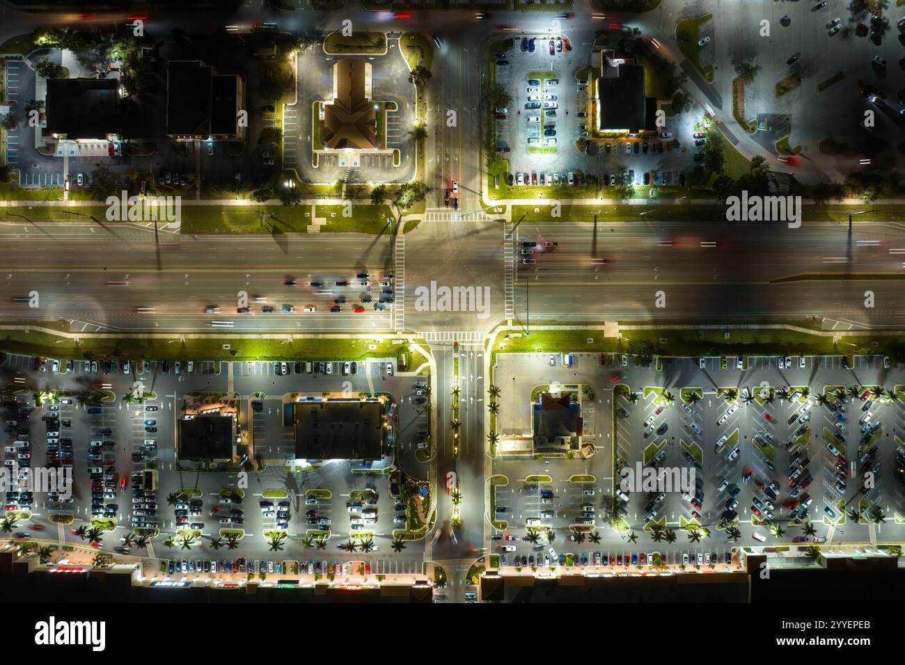 Strip mall plaza in North Port, Florida with illuminated traffic ...