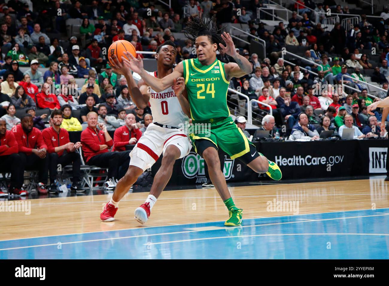 SAN JOSE, CA - DECEMBER 21: Stanford Cardinal guard Anthony Batson Jr. (0) battles Oregon Ducks ...