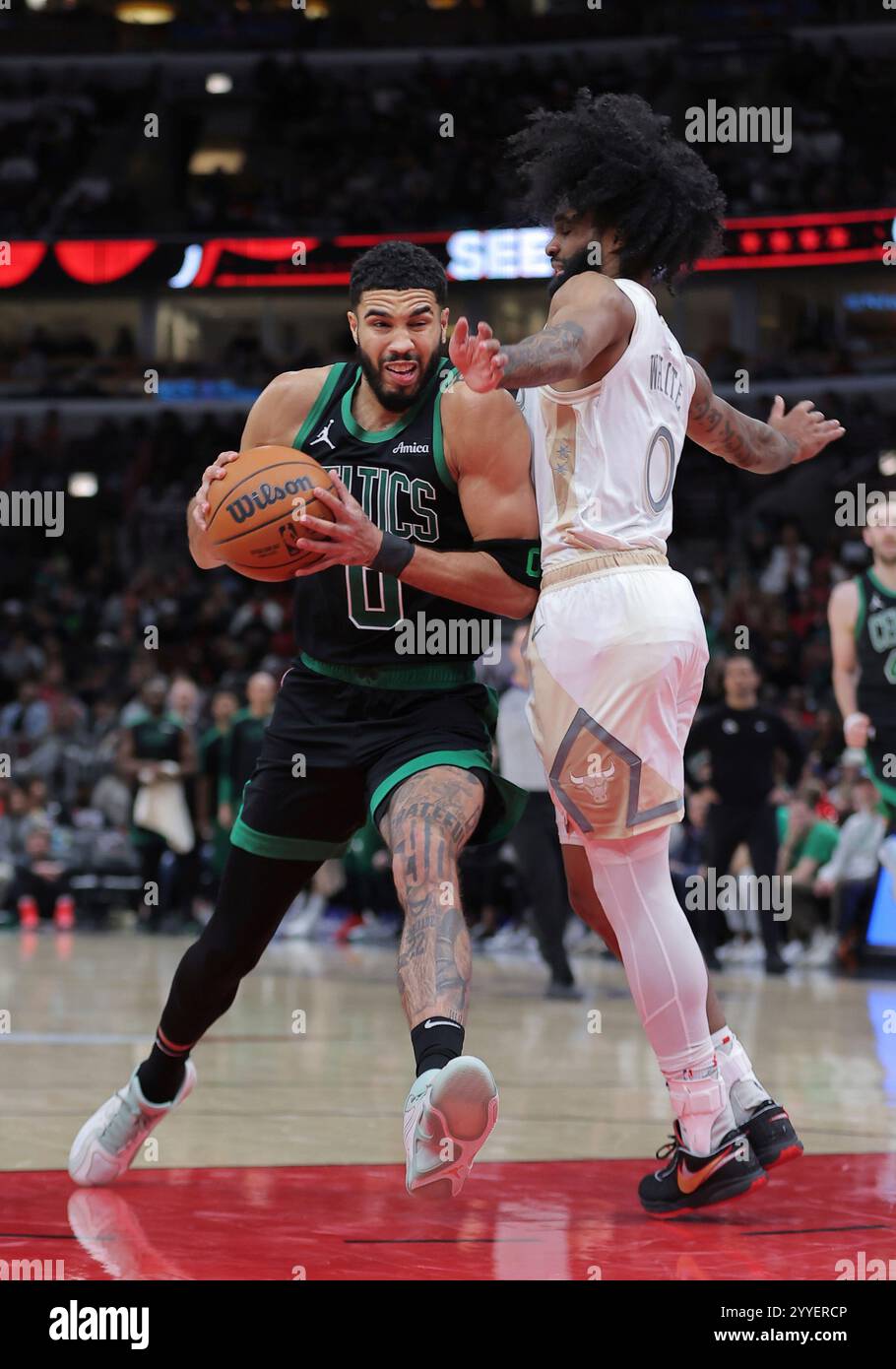 CHICAGO, IL - DECEMBER 21: Jayson Tatum #0 of the Boston Celtics drives ...
