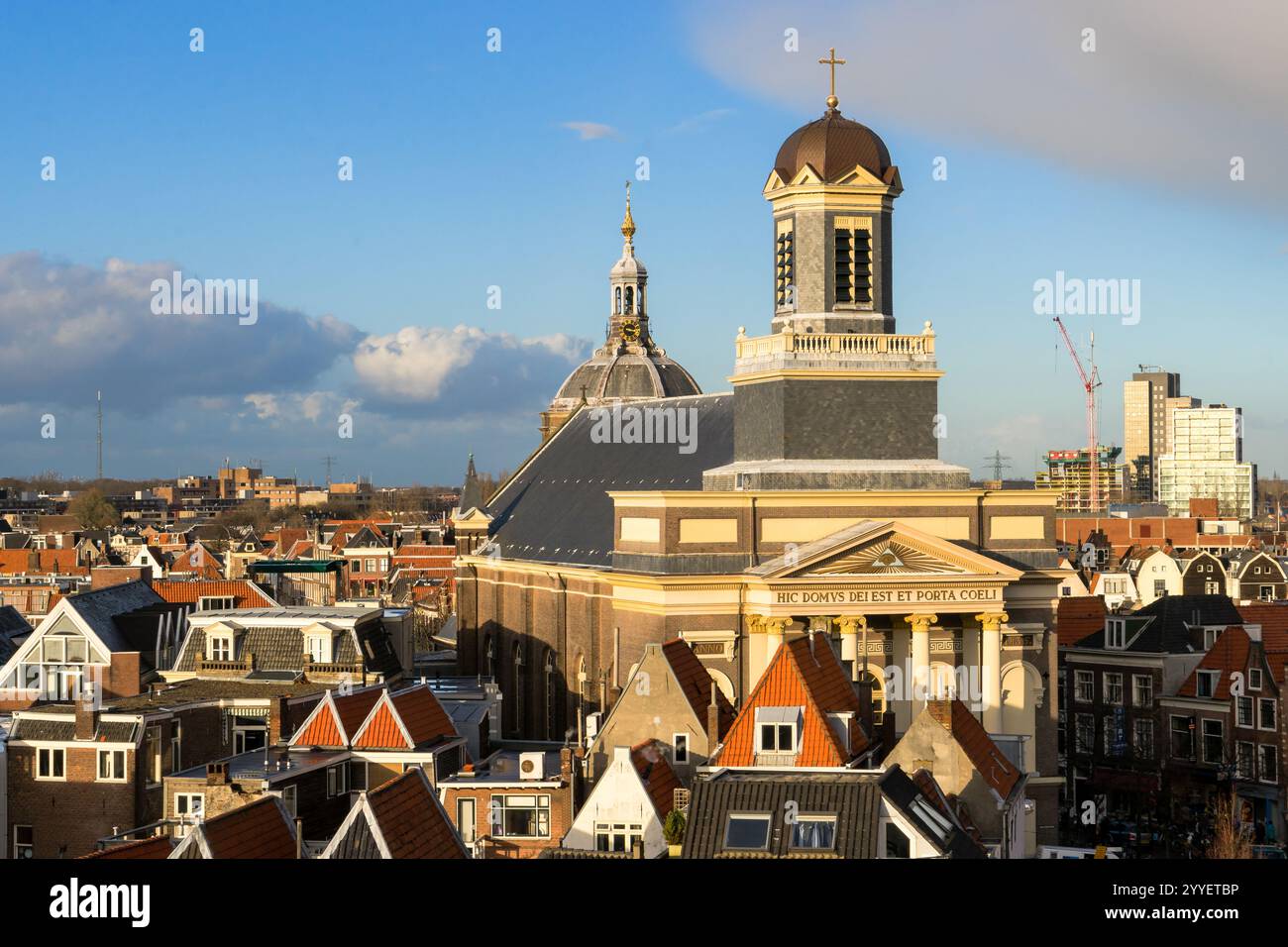 Cityscape view with dominant church surrounded dwelling houses Stock ...