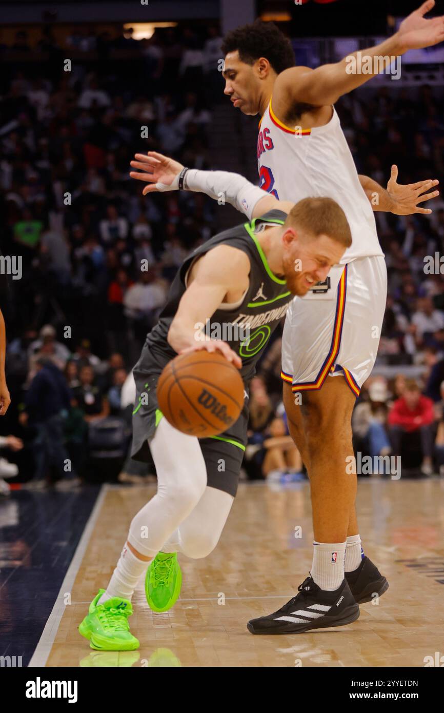 Minnesota Timberwolves guard Donte DiVincenzo (0) works his way past ...