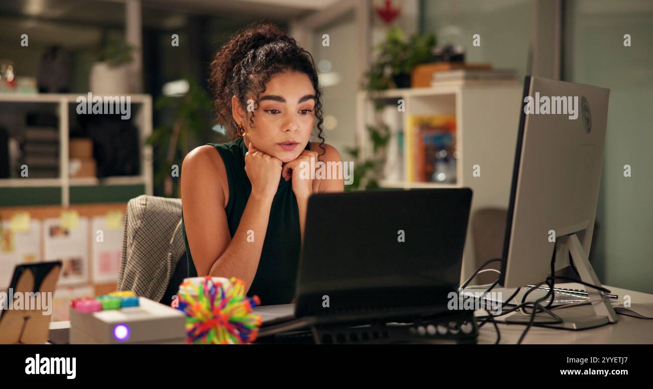 Business woman, laptop and overtime with internet, creative agency and ...