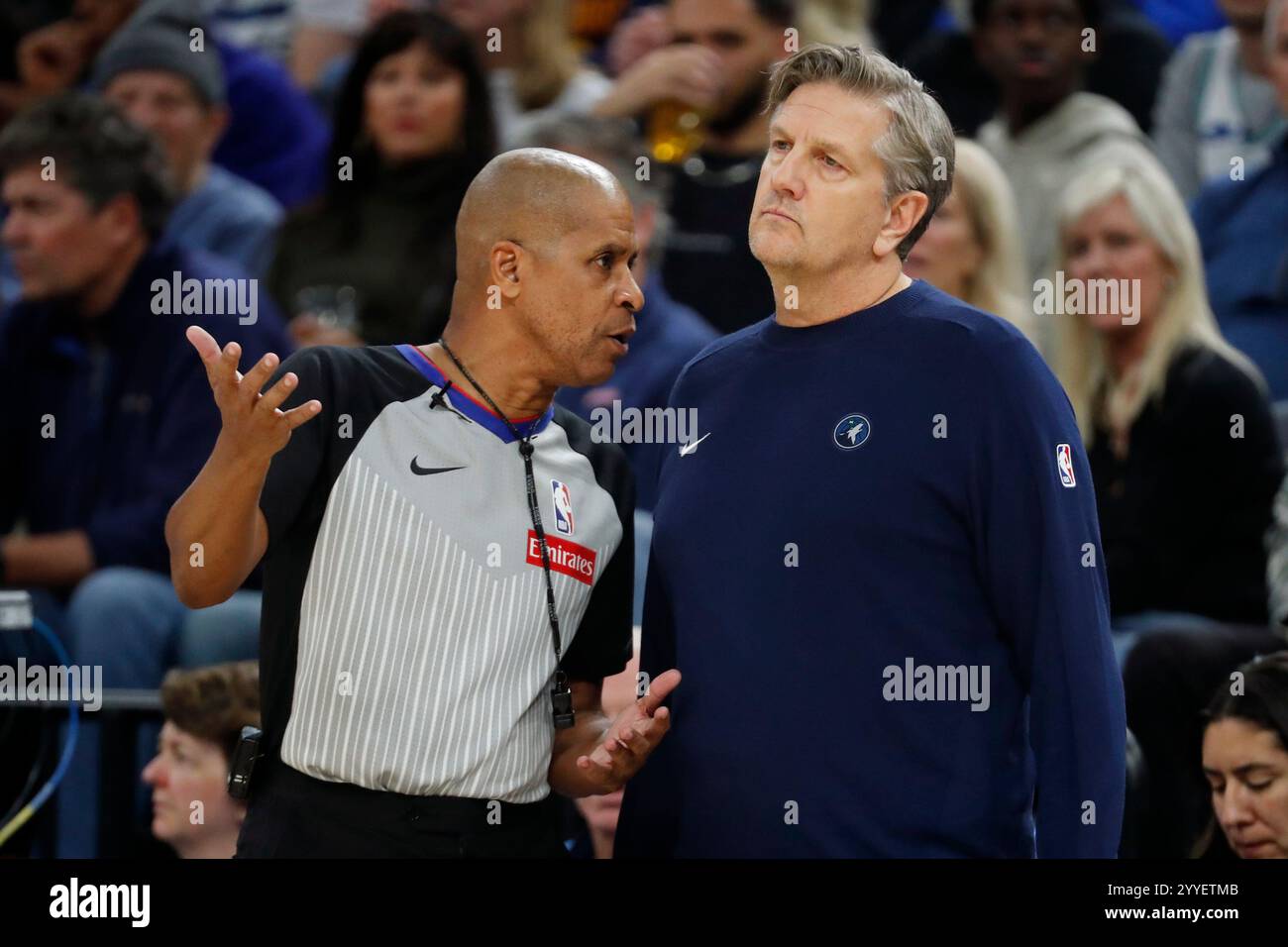 Referee Sean Corbin, left, explains his call to Minnesota Timberwolves ...