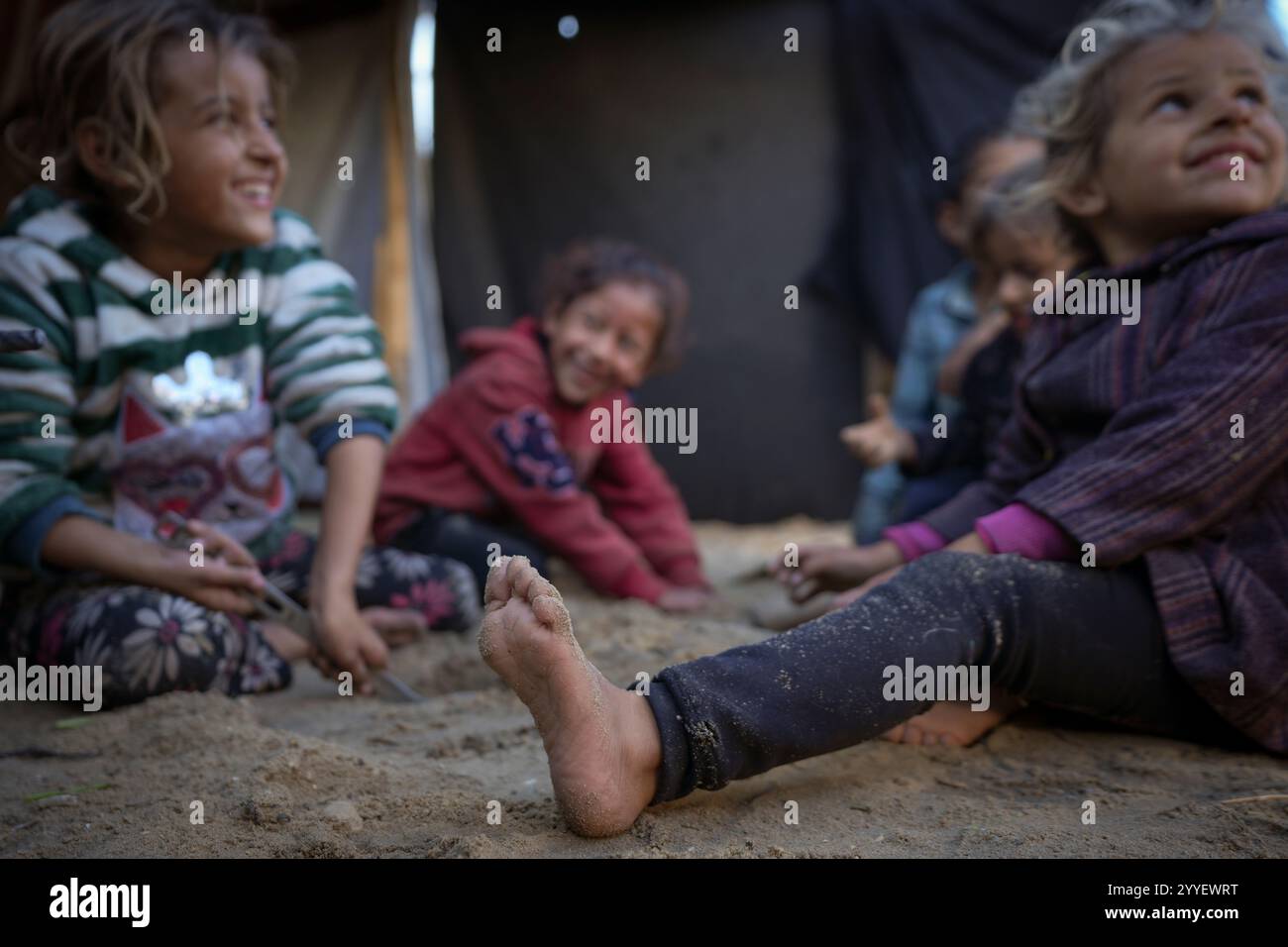 Grandchildren of Reda Abu Zarada, displaced from Jabaliya in northern ...