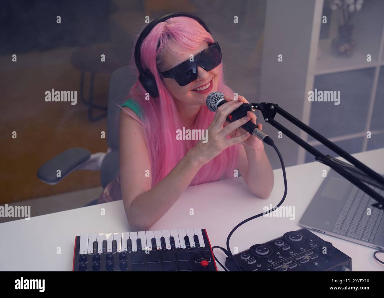 Beautiful young singer and musician broadcast from her home studio ...
