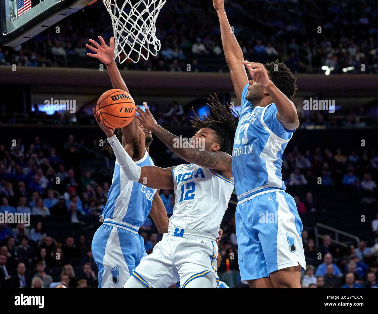 UCLA Bruins guard Sebastian Mack (12) drives to the basket against ...