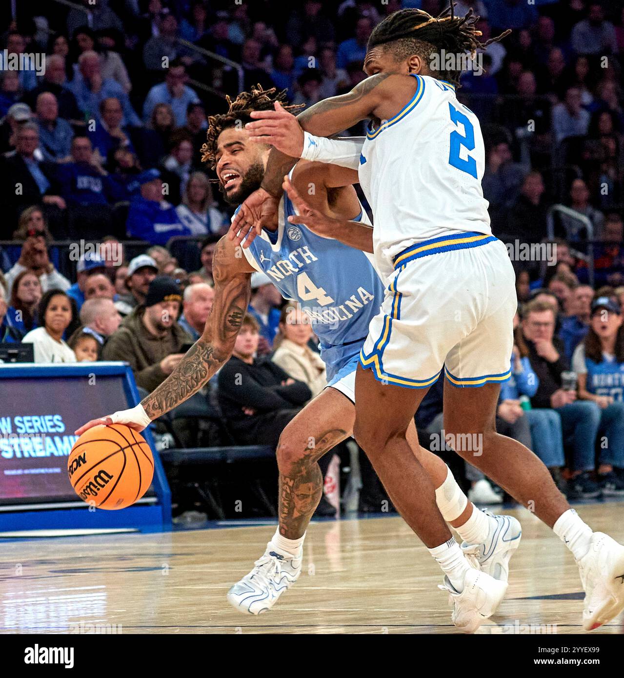 North Carolina Tar Heels guard RJ Davis (4) gets pressure from UCLA ...