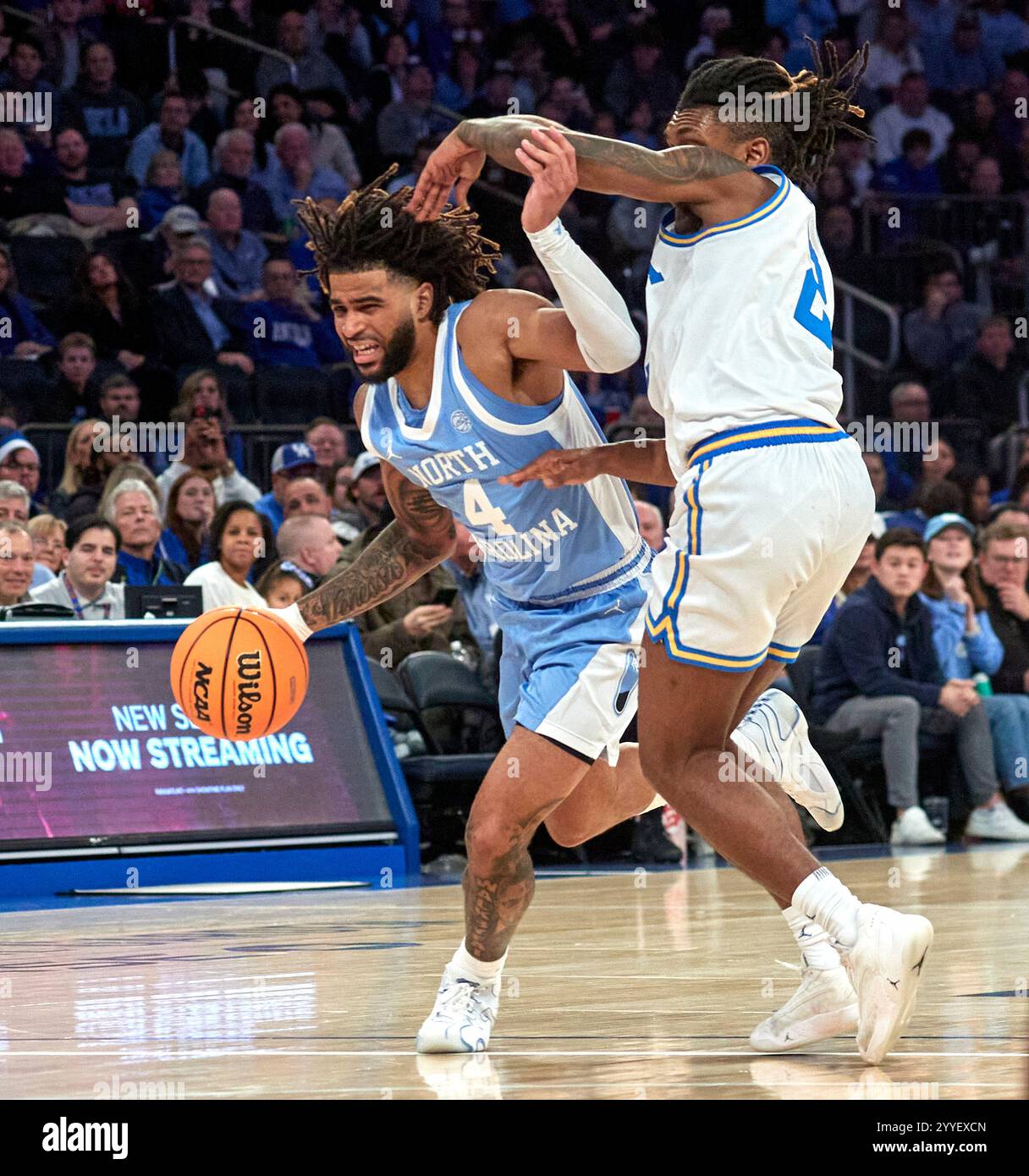 North Carolina Tar Heels guard RJ Davis (4) gets pressure from UCLA ...