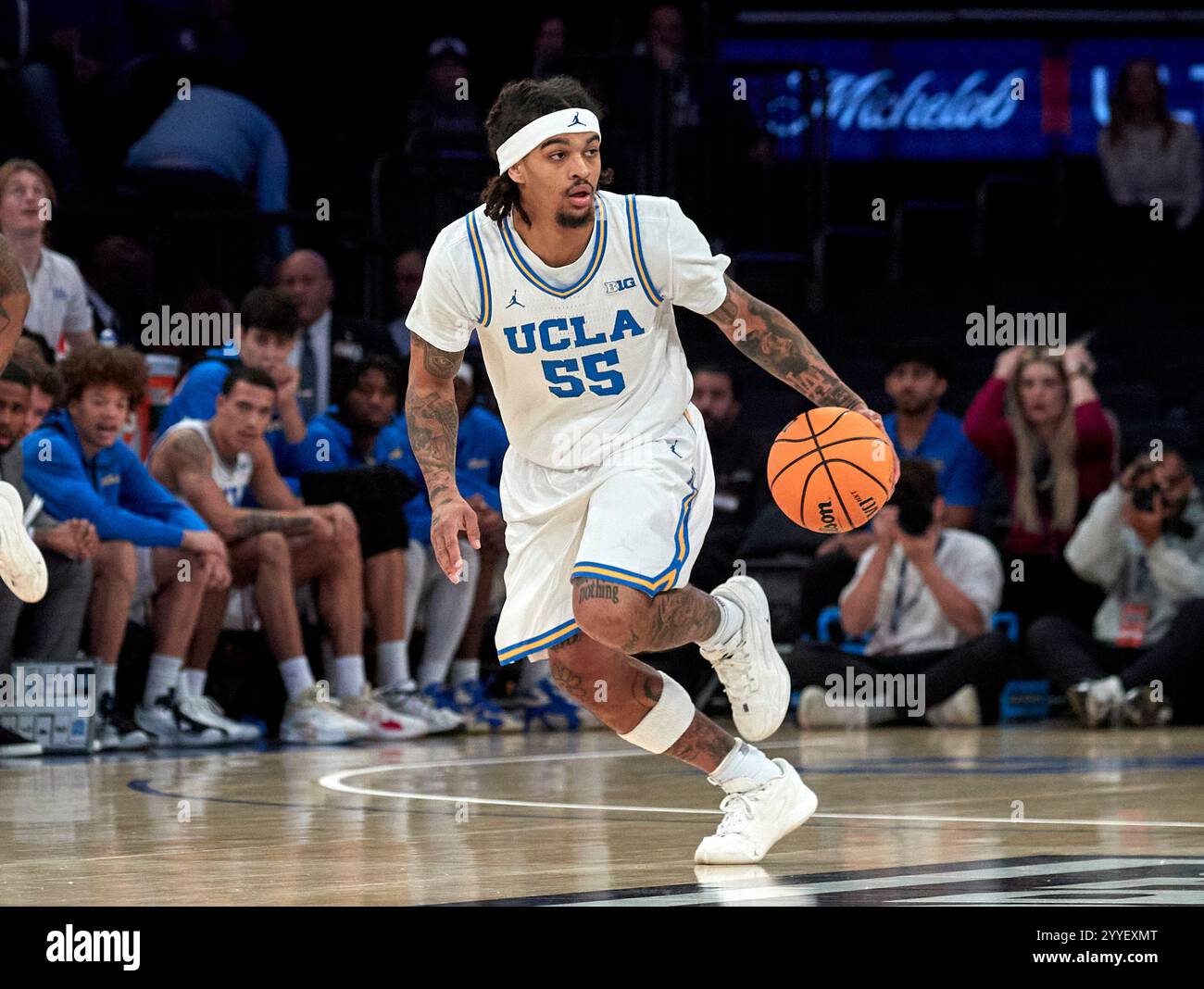 UCLA Bruins guard Skyy Clark (55) pushes the ball up court against the ...