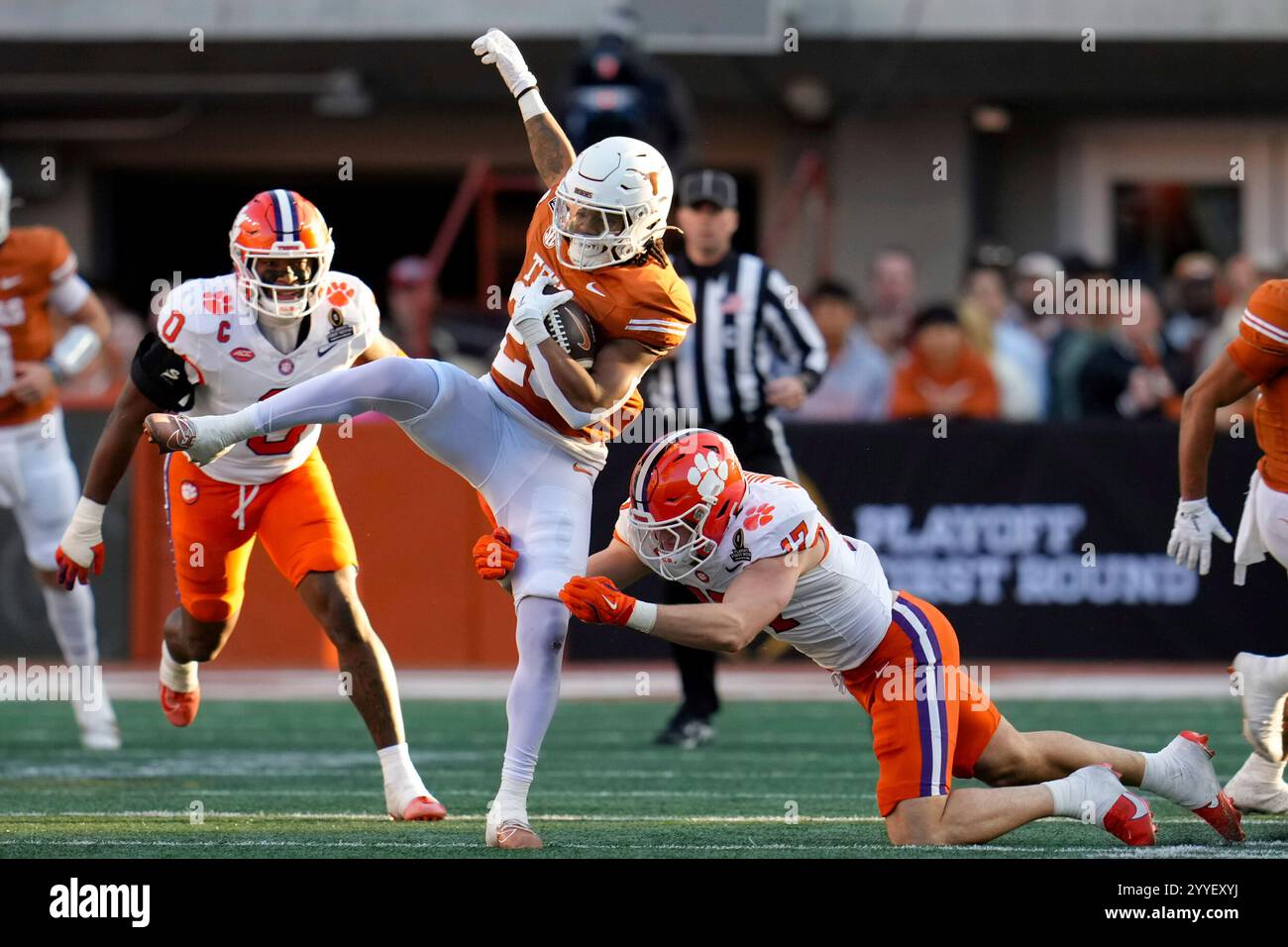 Austin, Texas. 21st Dec, 2024. Texas running back Jaydon Blue (23) carries the ball during the ...