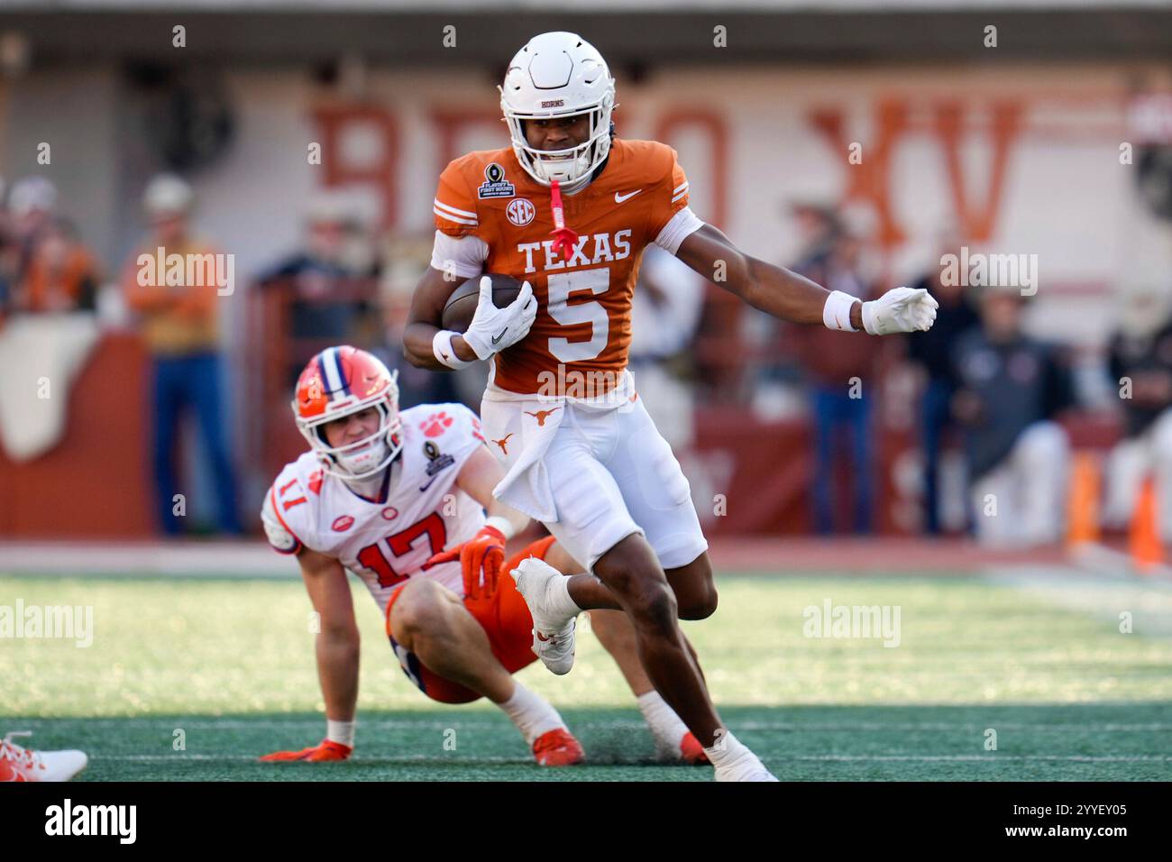 Texas wide receiver Ryan Wingo (5) carries the ball during the first ...