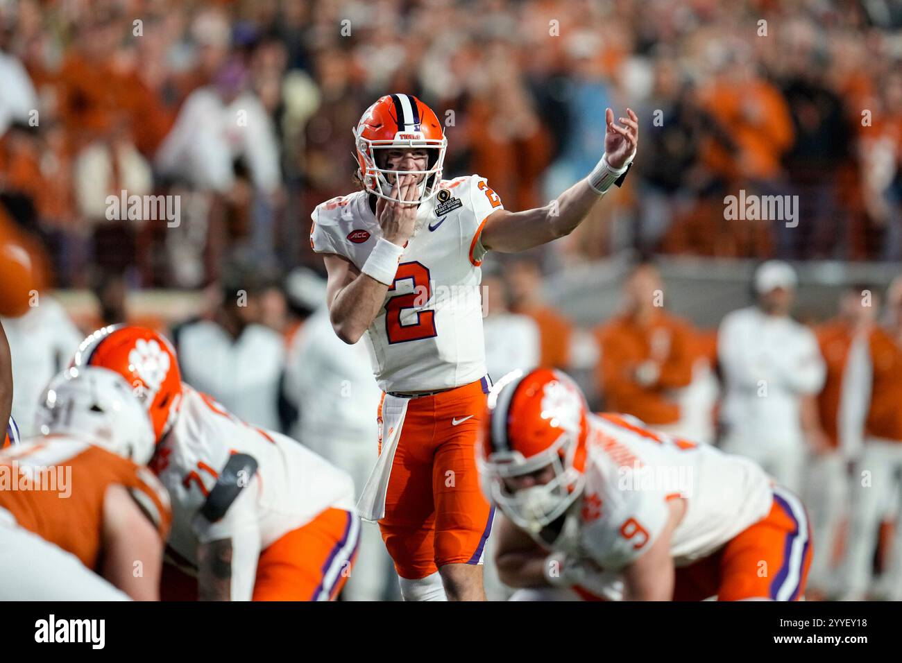 Austin, Texas. 21st Dec, 2024. Clemson quarterback Cade Klubnik (2) signals before a snap during ...