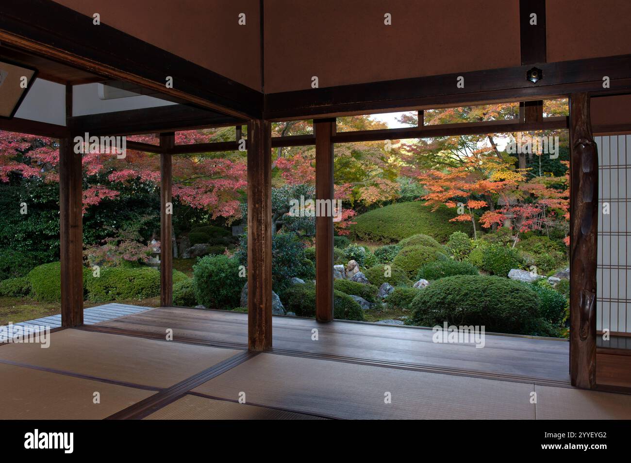 Open shoji paper screens reveal Japanese Zen landscape garden with ...