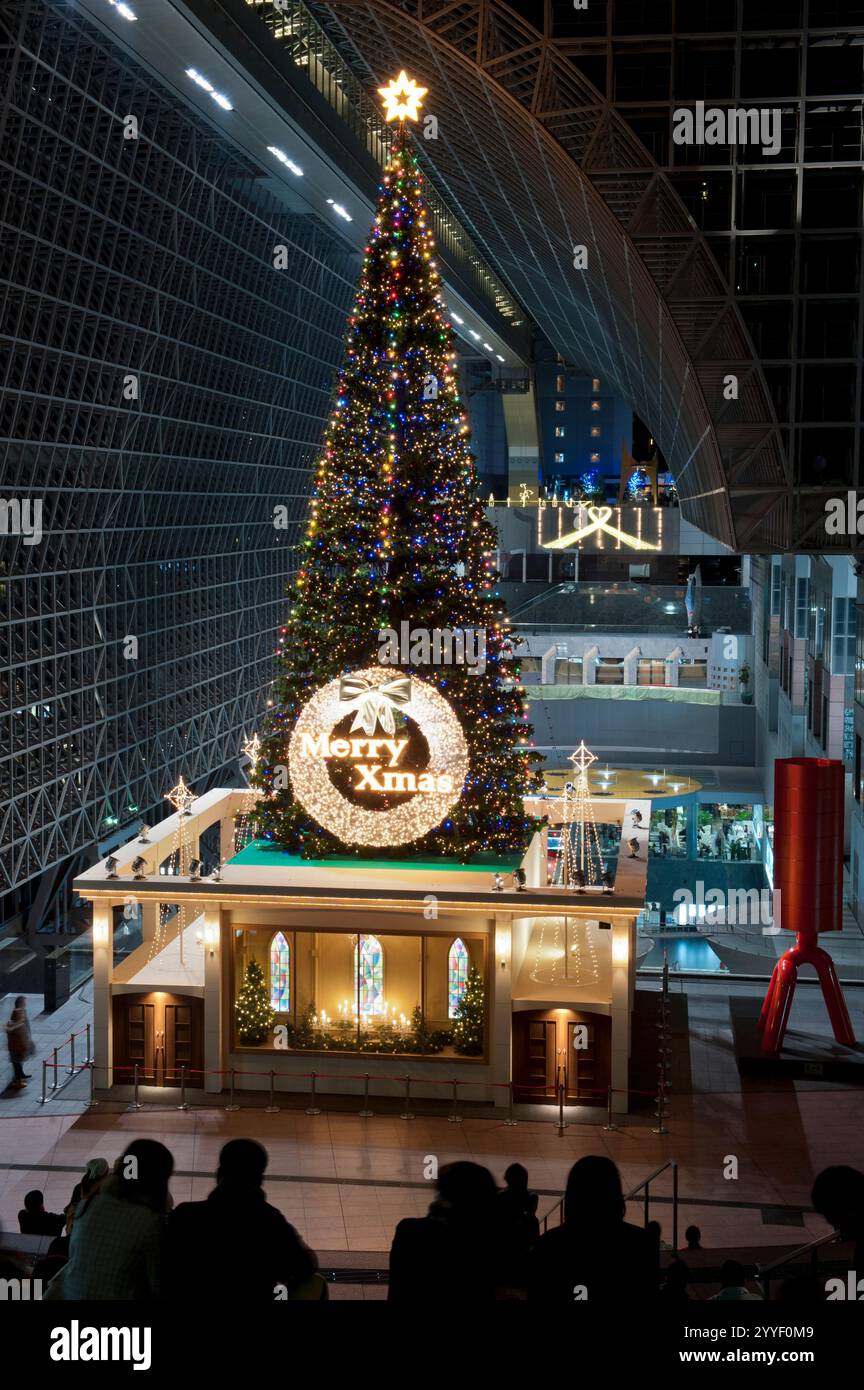 A giant Christmas tree displayed inside the cavernous interior of the ...