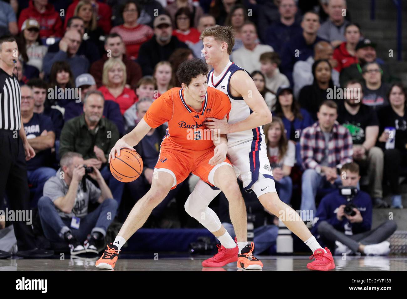 Bucknell center Noah Williamson (3) controls the ball while pressured ...