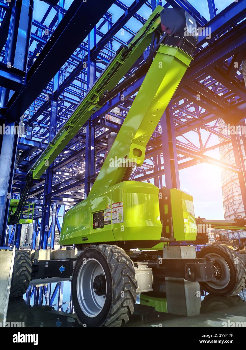 Heavy machinery involved in the process steel structure is under ...